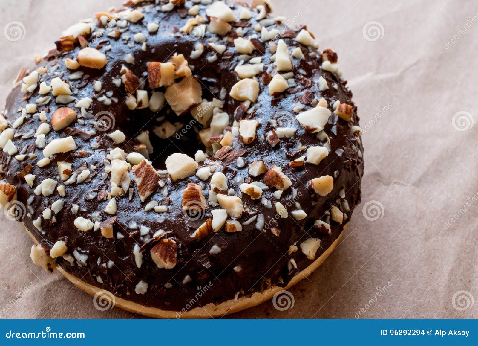 Chocolate Donut with Diced Hazelnut Pieces. Stock Photo - Image of cake ...
