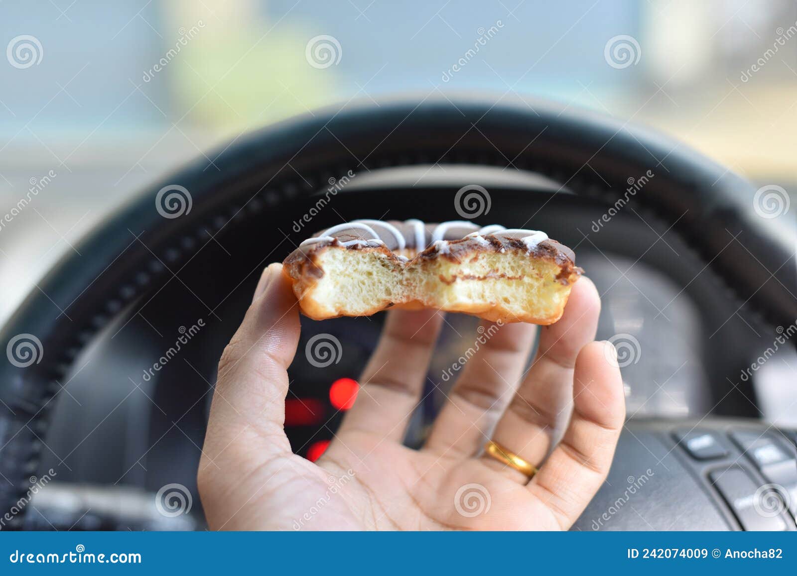 Chocolate Donuts in Hand in Car Driving Stock Image - Image of baked ...