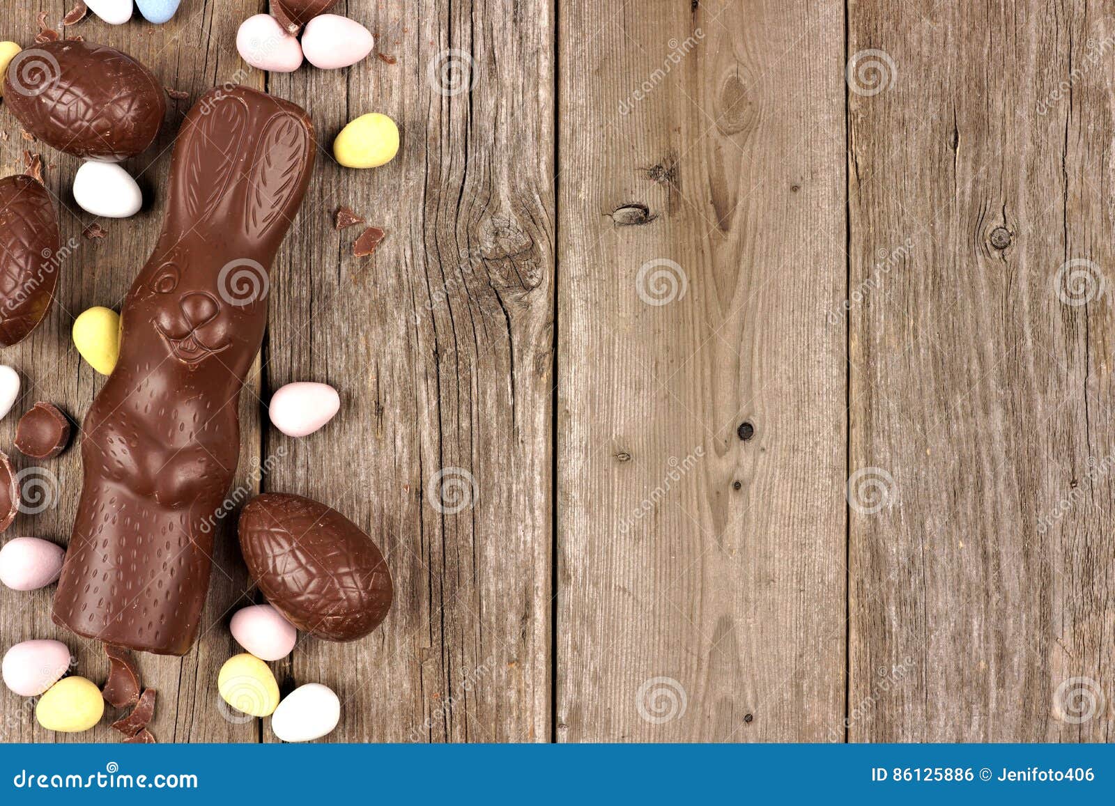 Easter Egg Side Border Against Yellow Wood Stock Photo