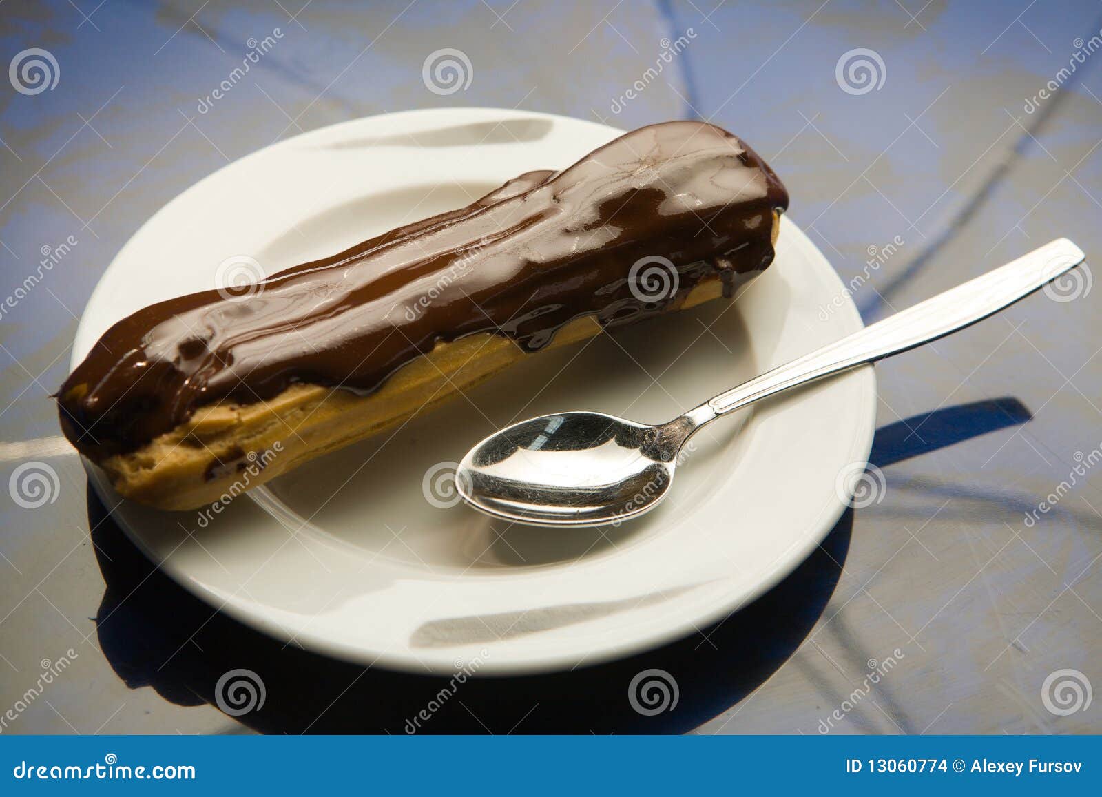 Chocolate eclair stock photo. Image of spoon, frosting - 13060774
