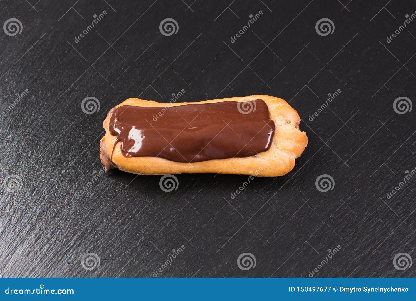 Chocolate Eclair on Black Background. Eclairs with Glaze. Stock Image ...