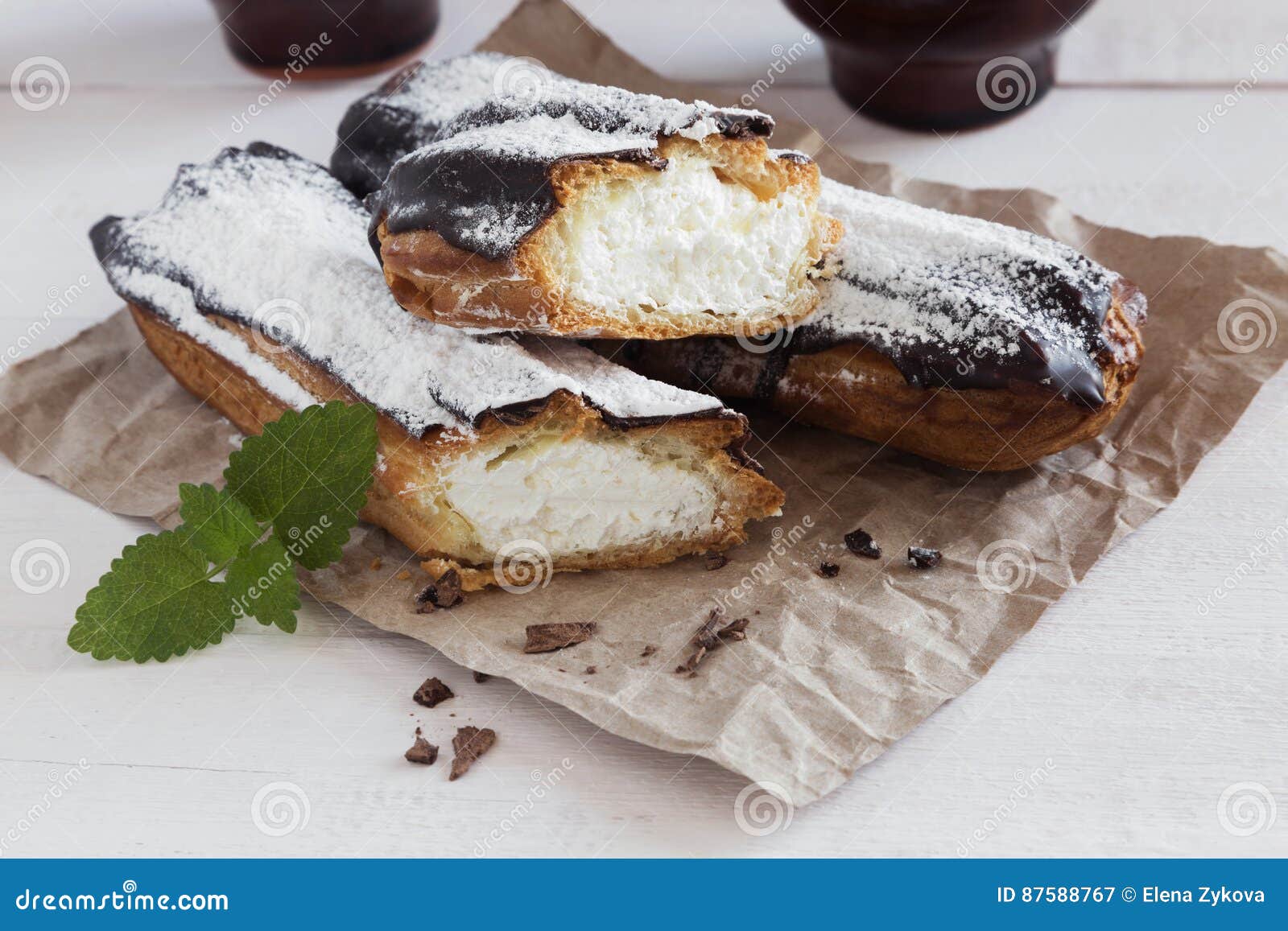 Chocolate Eclairs with Sugar Powder Close-up Stock Image - Image of ...
