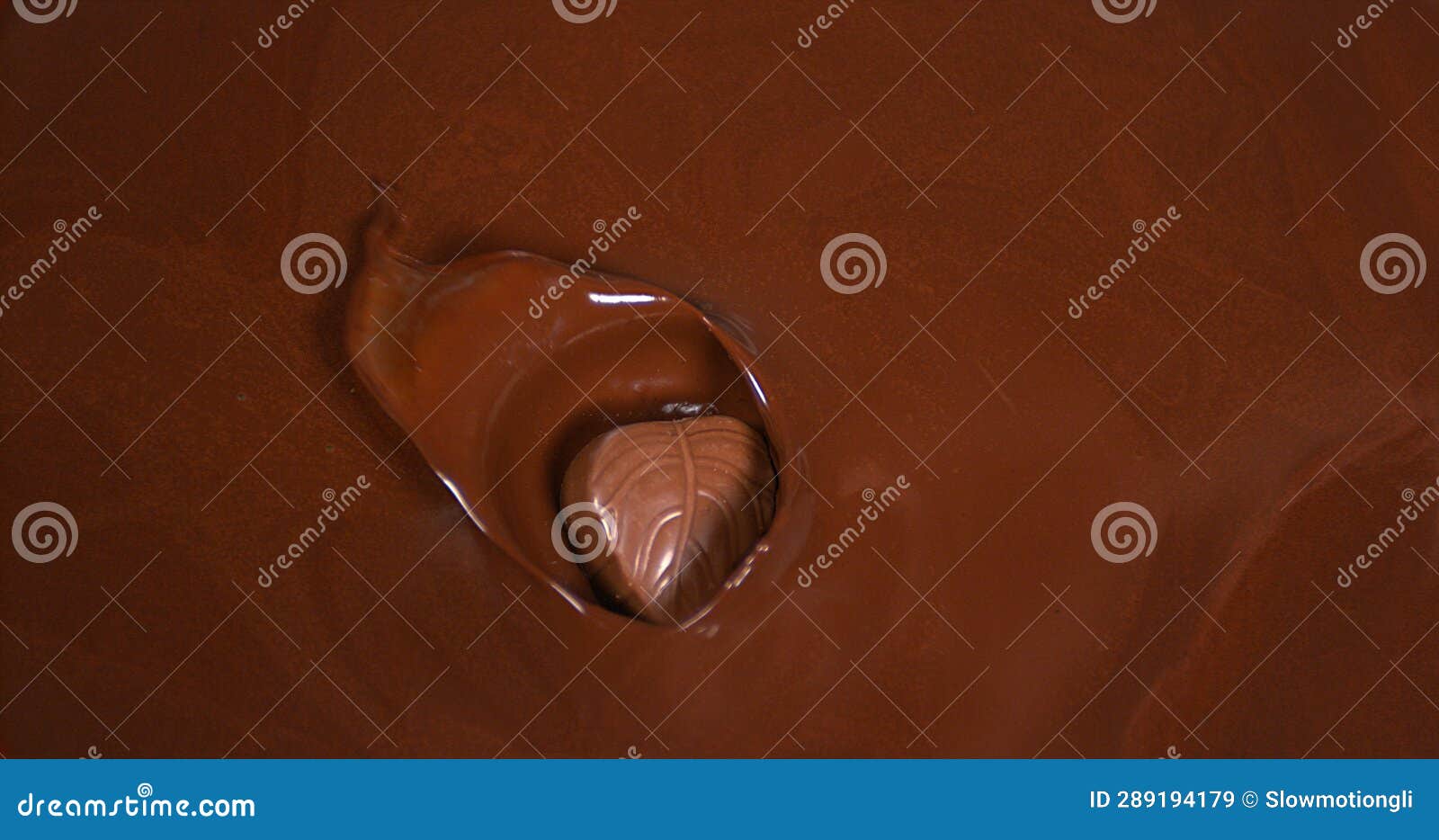 Chocolate Falling into Milk Chocolate Stock Image - Image of ...
