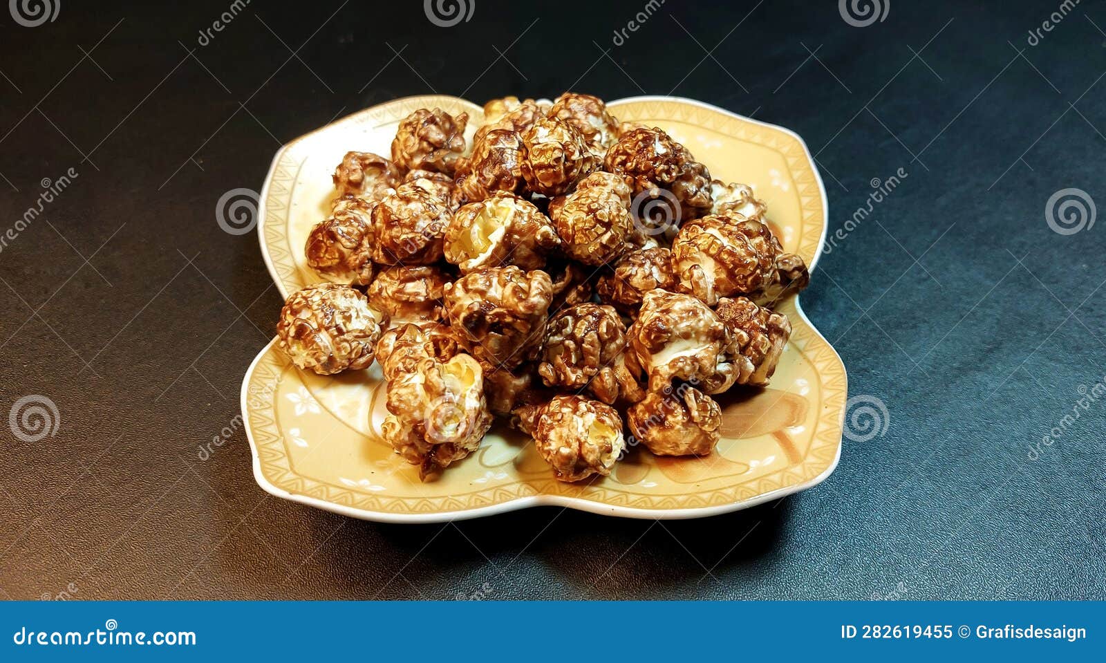 Chocolate-flavored Popcorn in a Modern Golden Plate Stock Image - Image ...