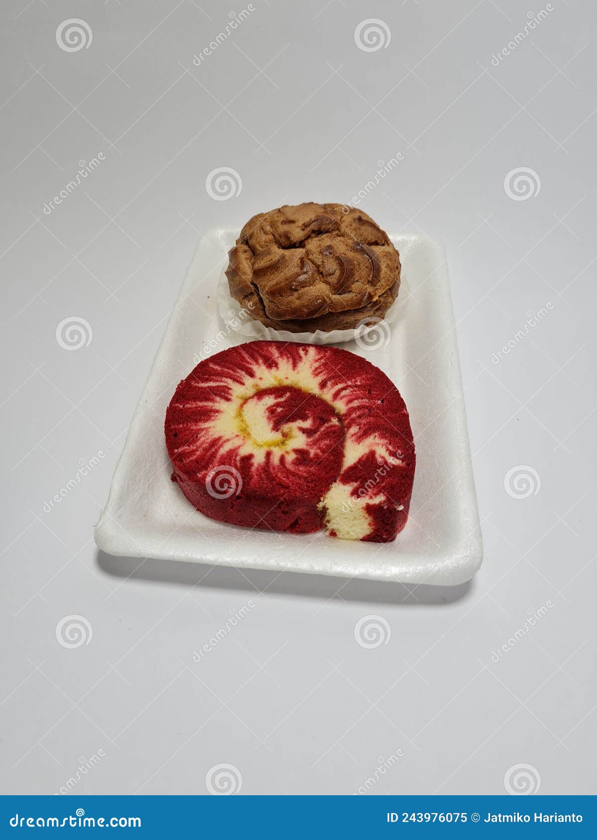 Chocolate-flavored Rolls and Eclairs in a White Container Stock Image ...