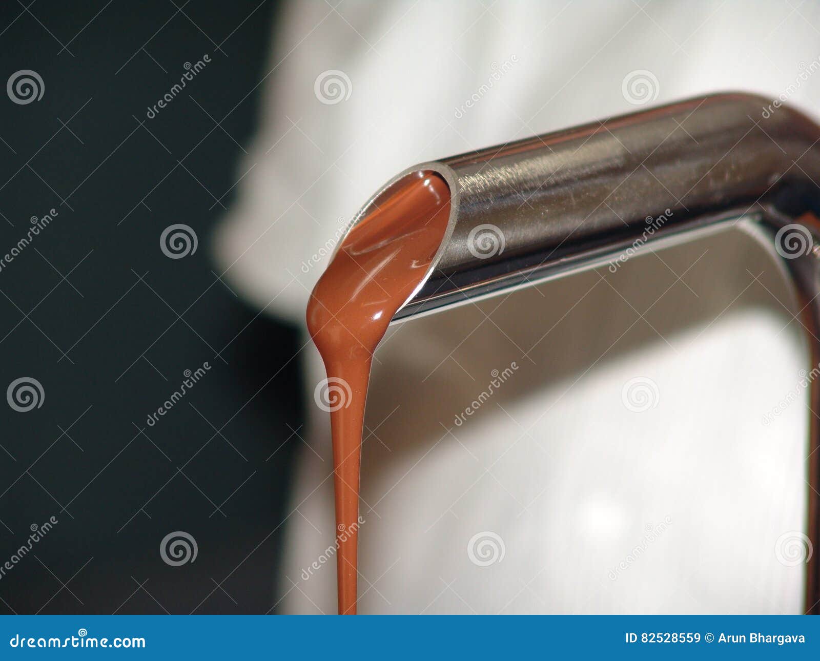 Chocolate Flowing from Pipe Stock Image - Image of flow, drop: 82528559
