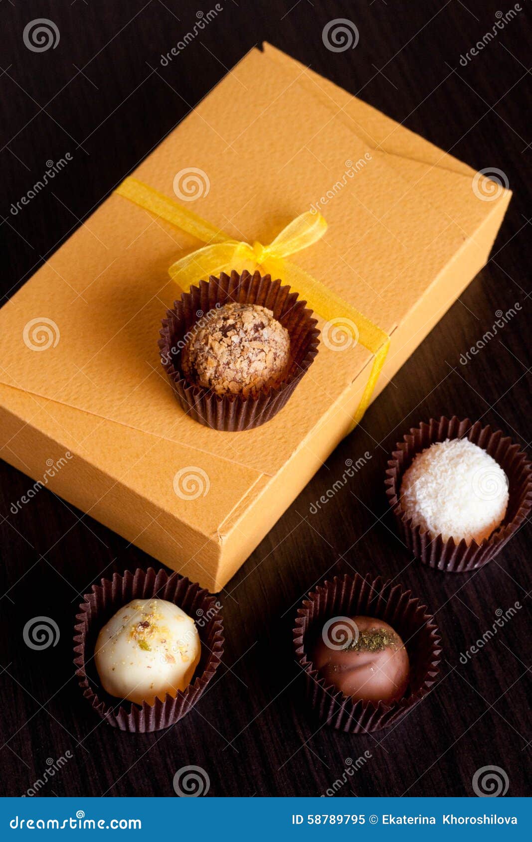 Chocolate Handmade Candies on a Black Table. Chocolate Box Stock Image ...