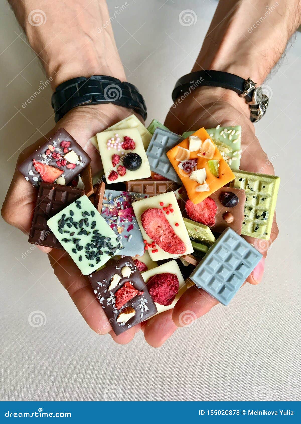 Chocolate in hands macro stock photo. Image of hands - 155020878