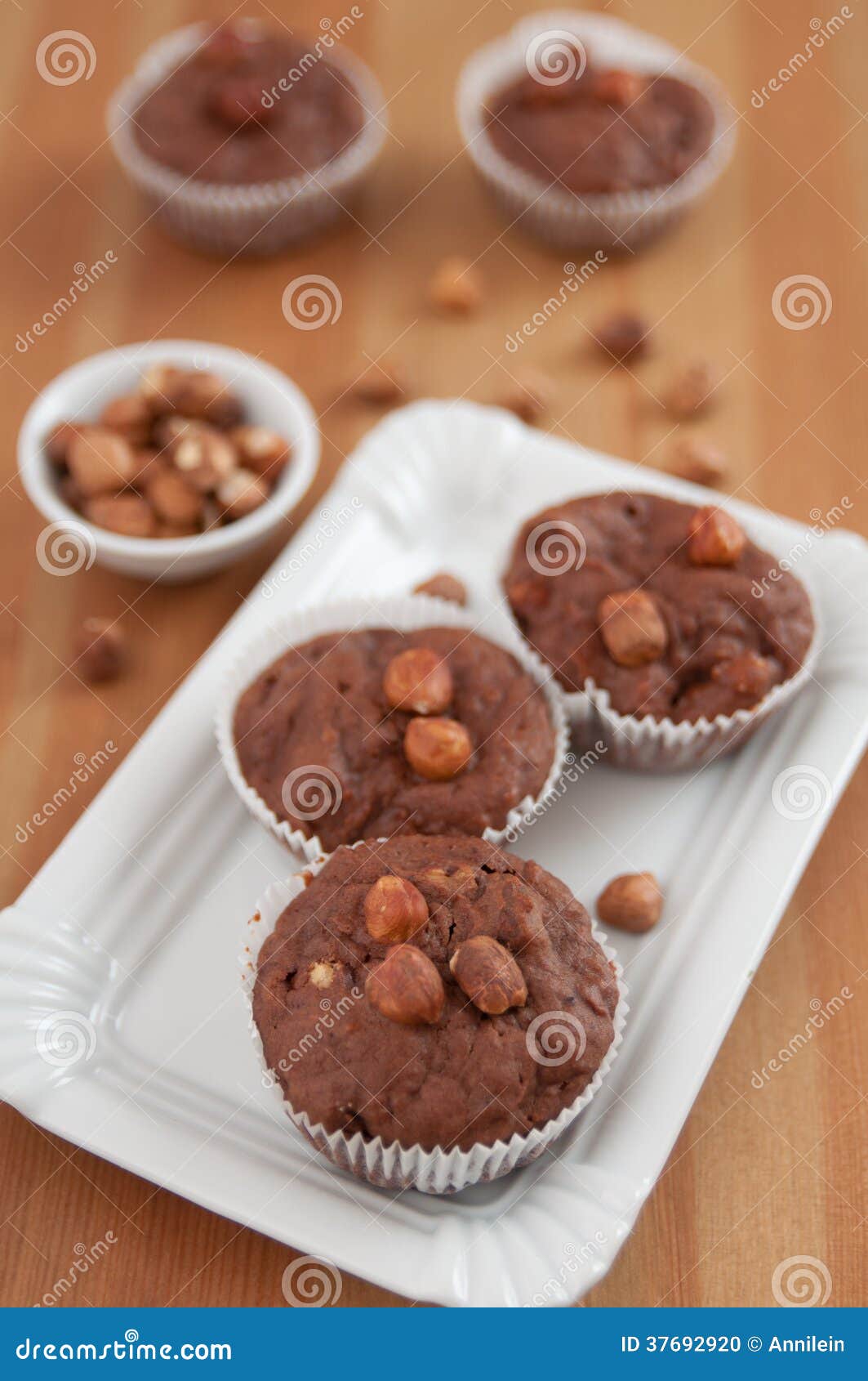 Chocolate Hazelnut Muffins stock photo. Image of paper - 37692920