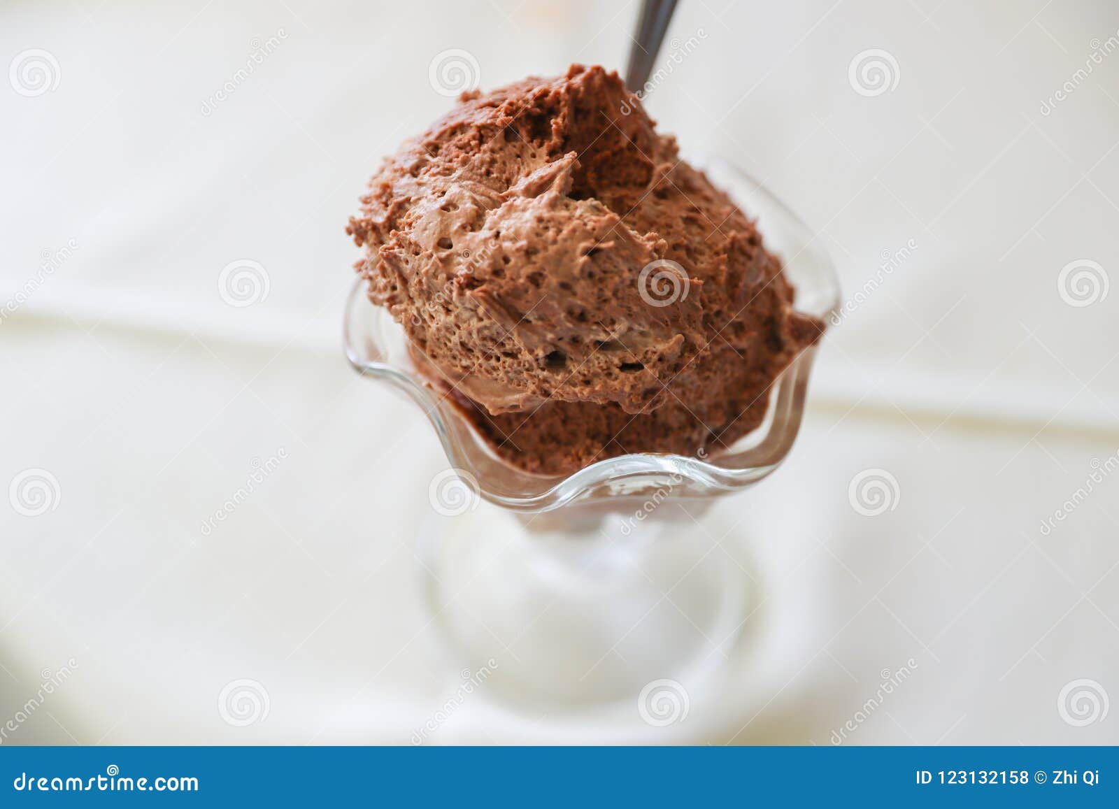 Chocolate Mousse with a Spoon in Portion Glasses on White Table Stock ...