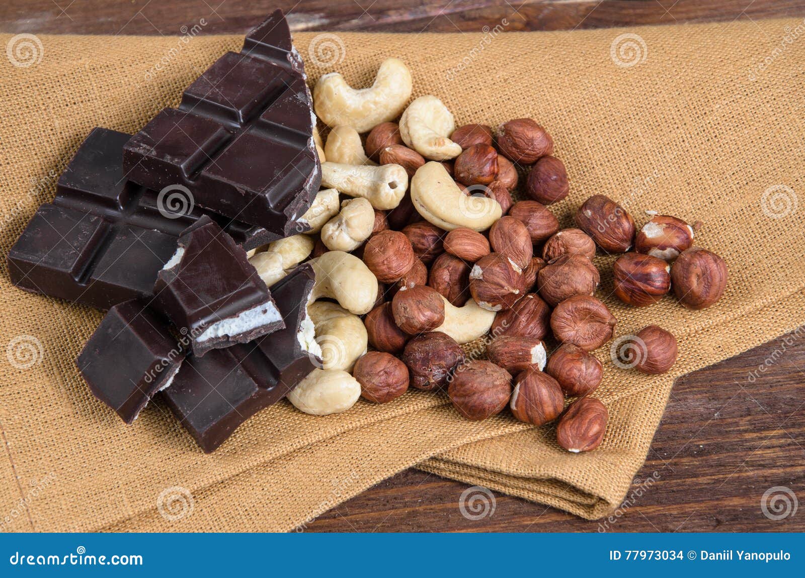 Chocolate and Nuts with Napkin on Wood Stock Photo - Image of ...