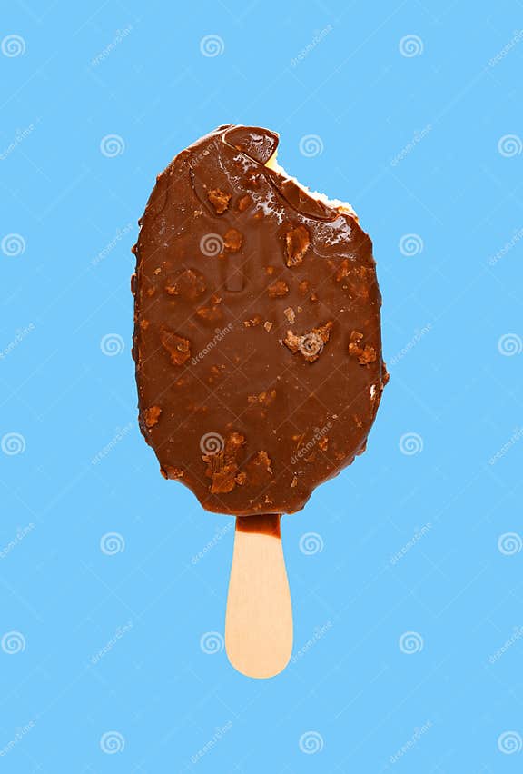 Chocolate Outer Popsicle with a Bite on a Blue Background Stock Image ...