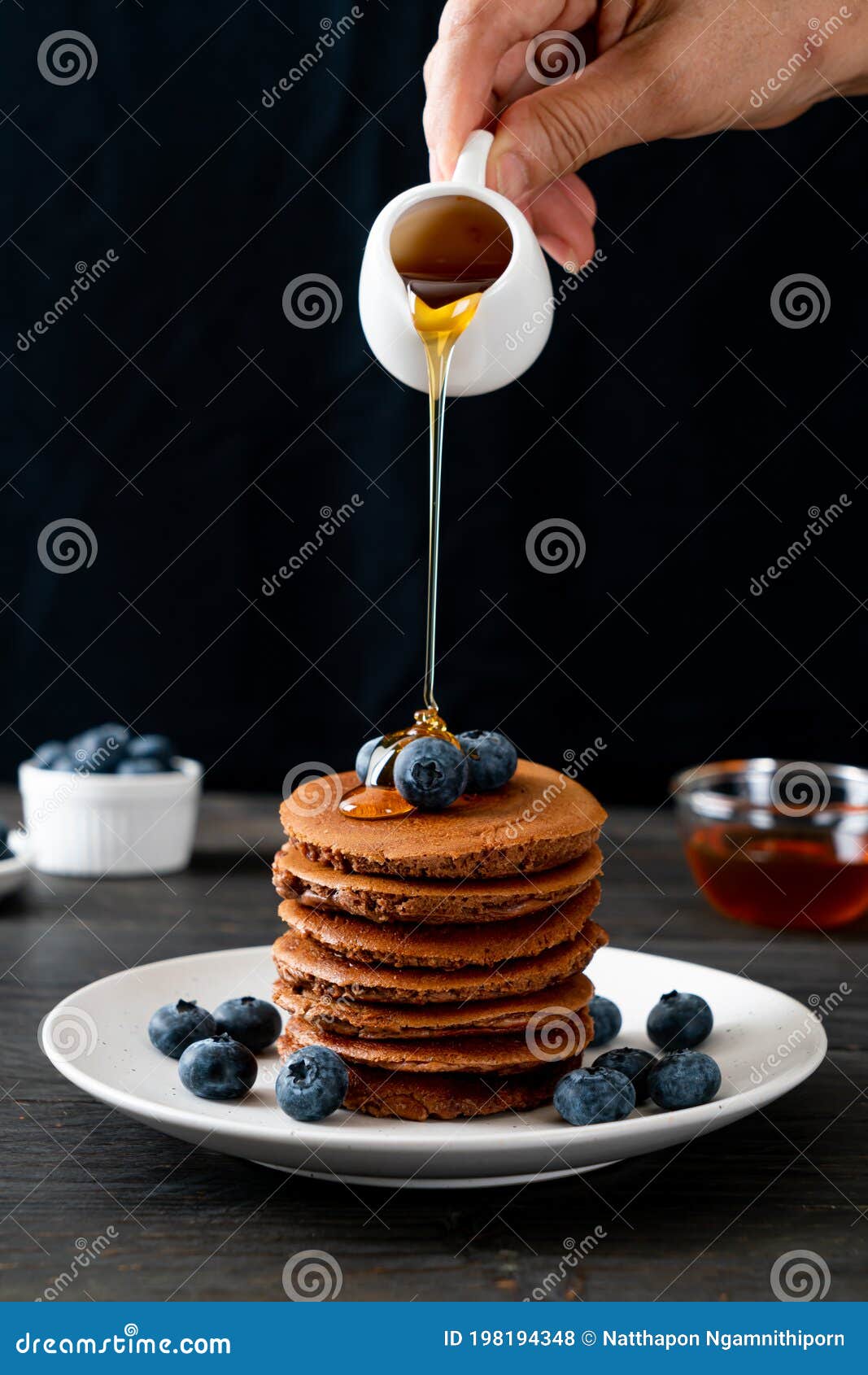 Chocolate Pancake Stack with Blueberry and Honey Stock Photo - Image of ...