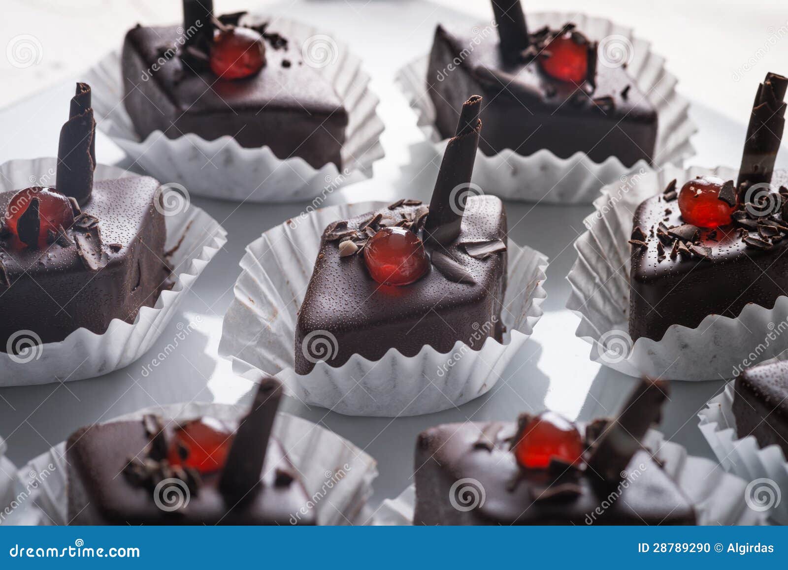 Chocolate Petits Fours Glace Stock Photo - Image of bites, frosted ...