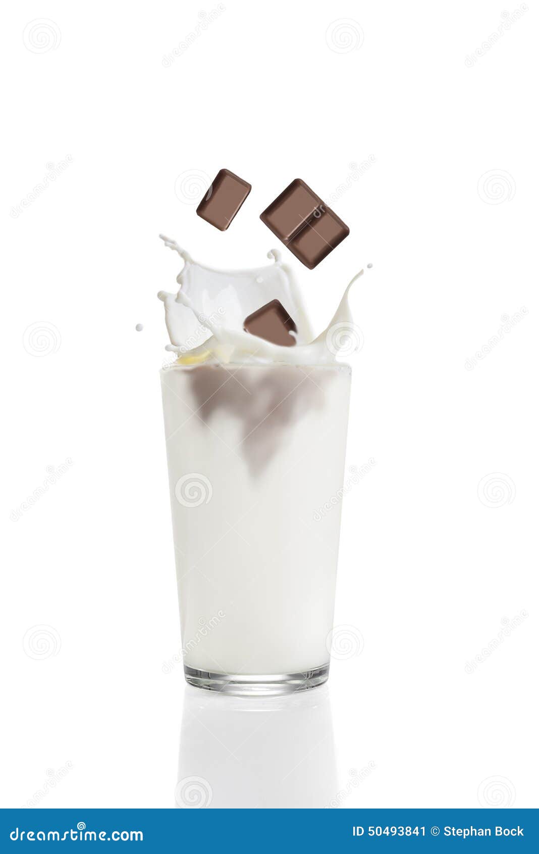 Chocolate Pieces Falling into Glass with Milk Stock Image - Image of ...