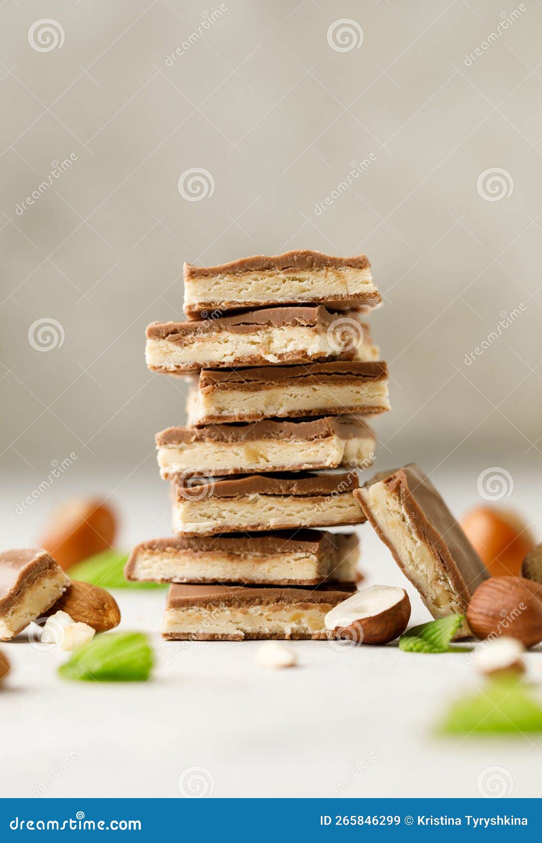 Chocolate Pieces on White Background with Hazelnut. Stack of Chocolate ...