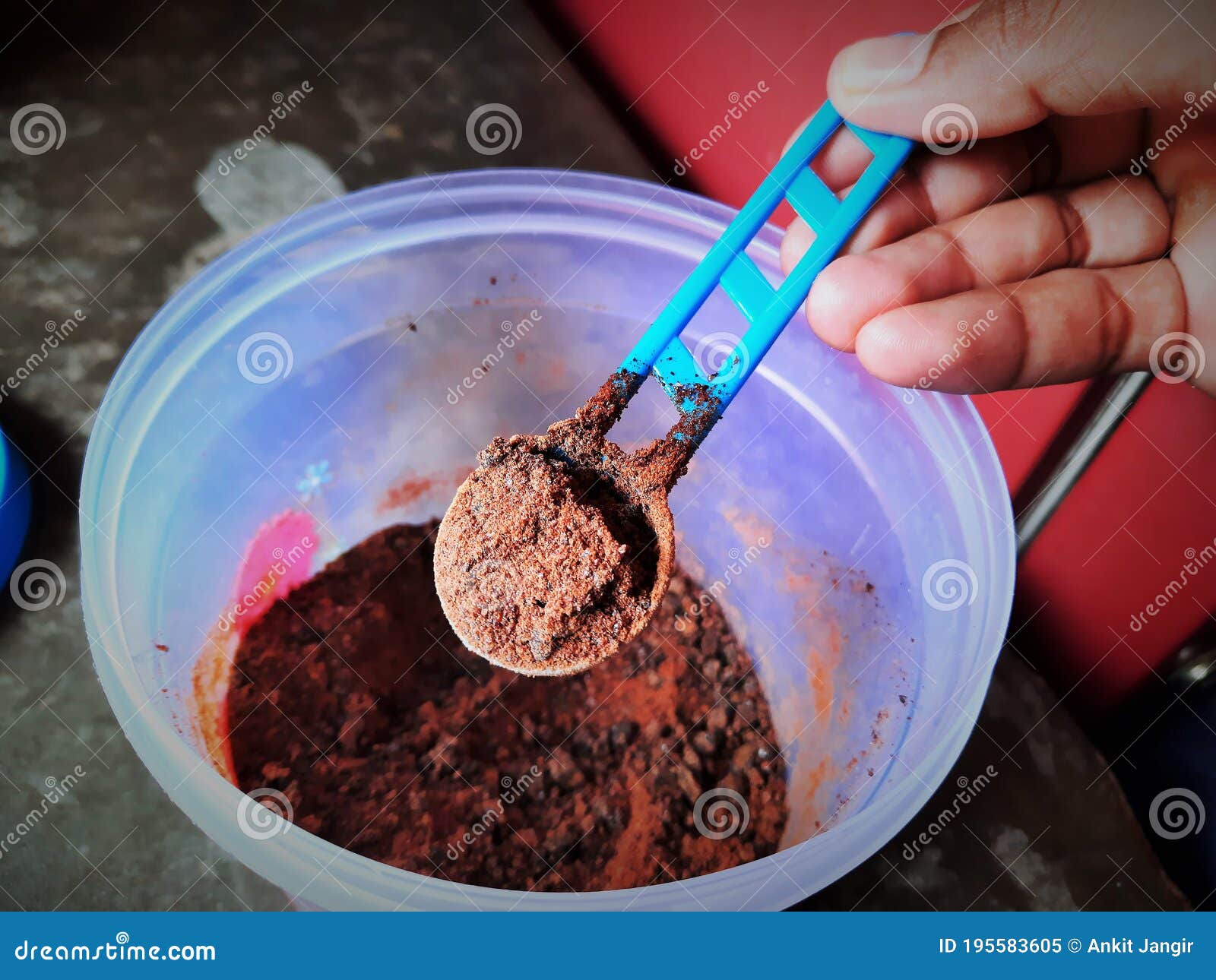 Chocolate Powder in Tea Spoon Ready To Add in Milk Stock Image - Image ...