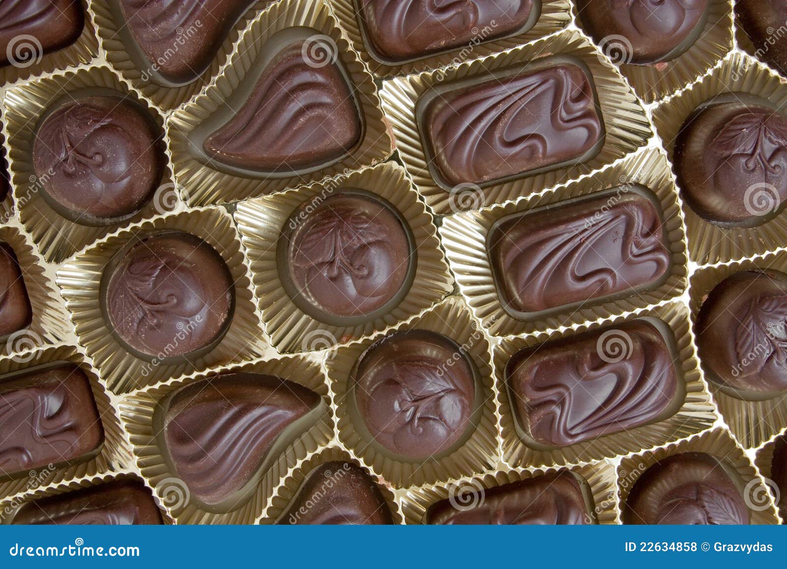 Chocolate Pralines in a Golden Box Stock Photo - Image of sugar ...