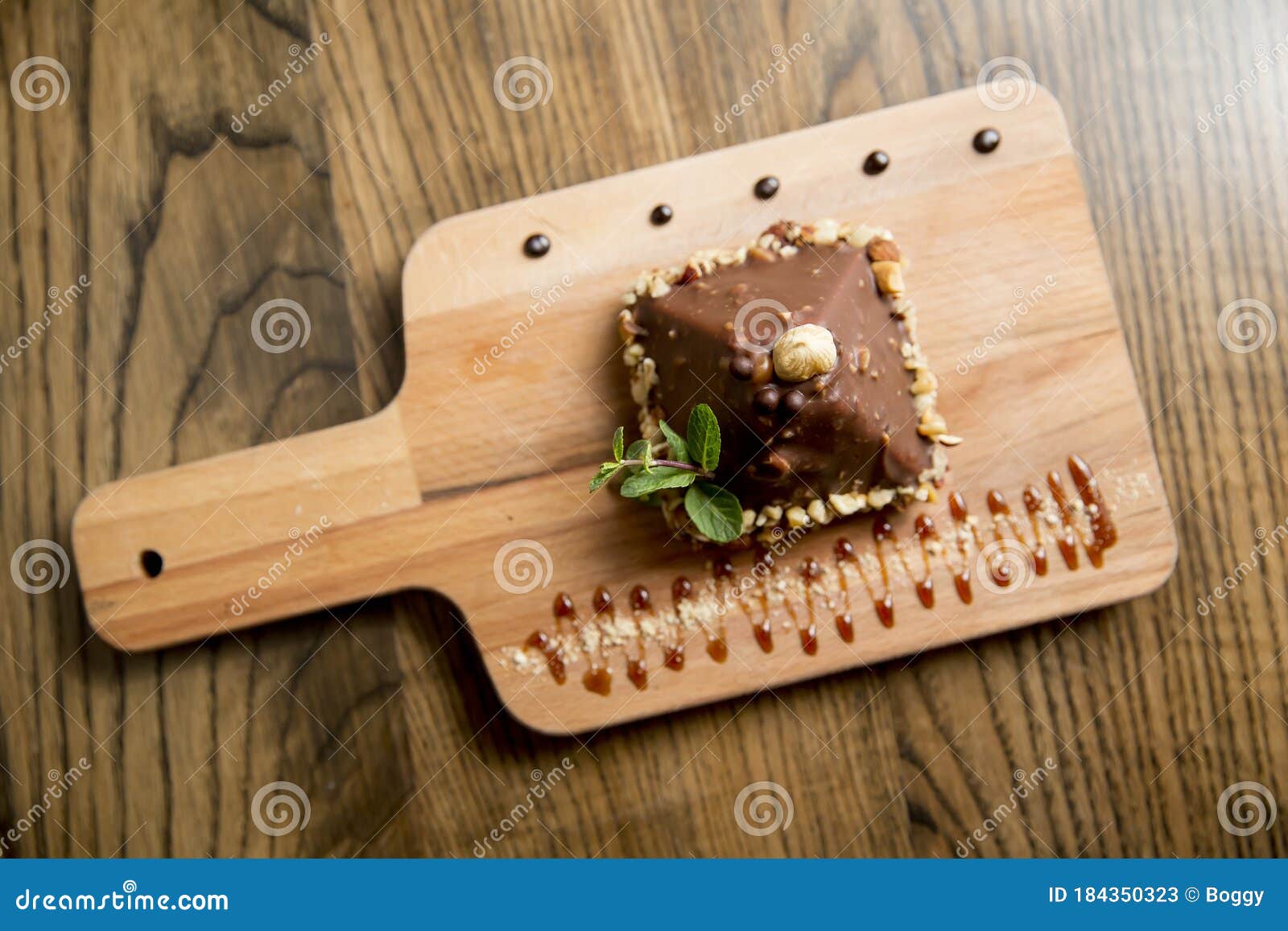 Chocolate Pyramid Shape Cake with Nuts Stock Image - Image of dark ...