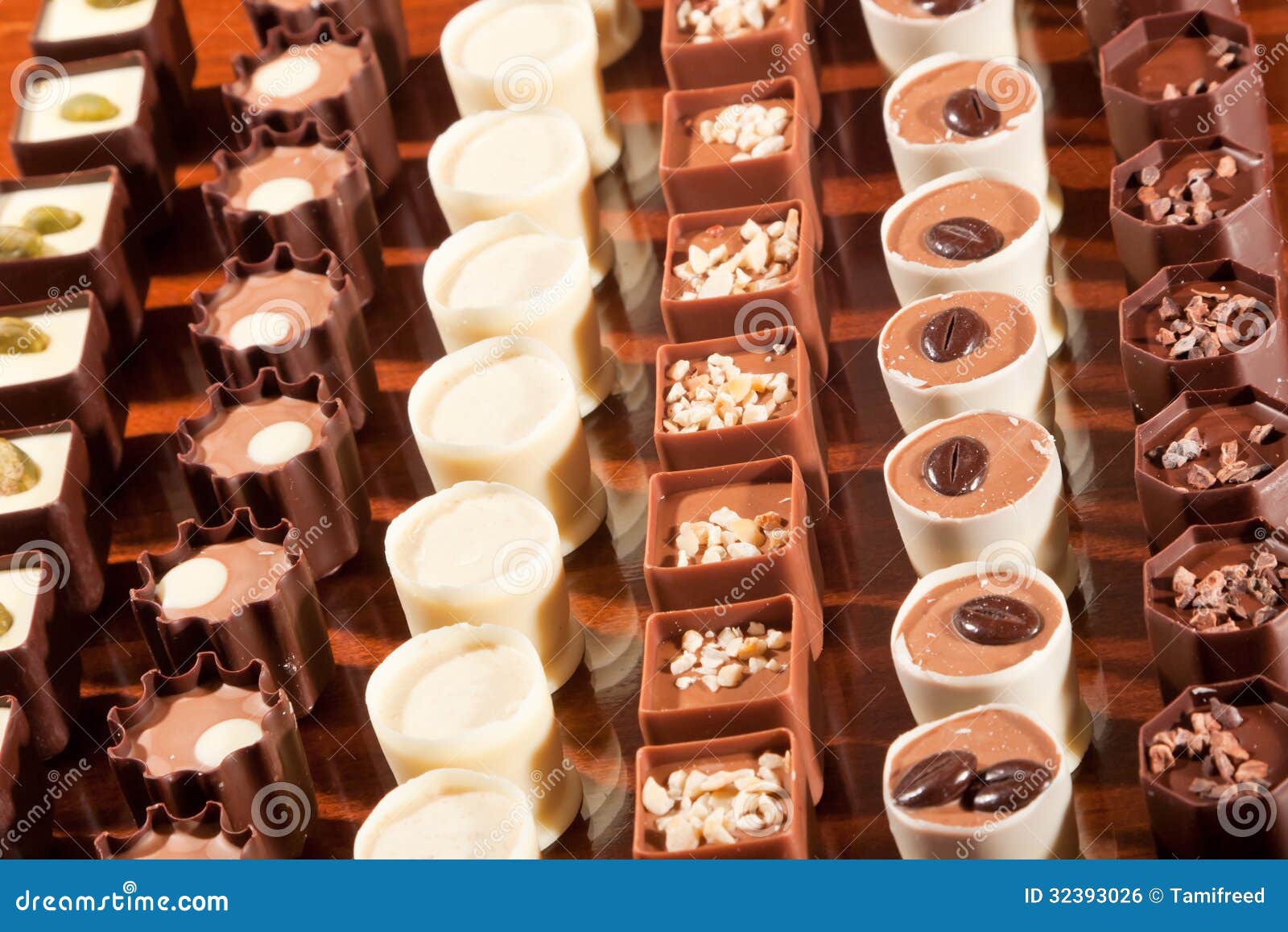 Chocolate in Rows stock photo. Image of cups, delicate - 32393026