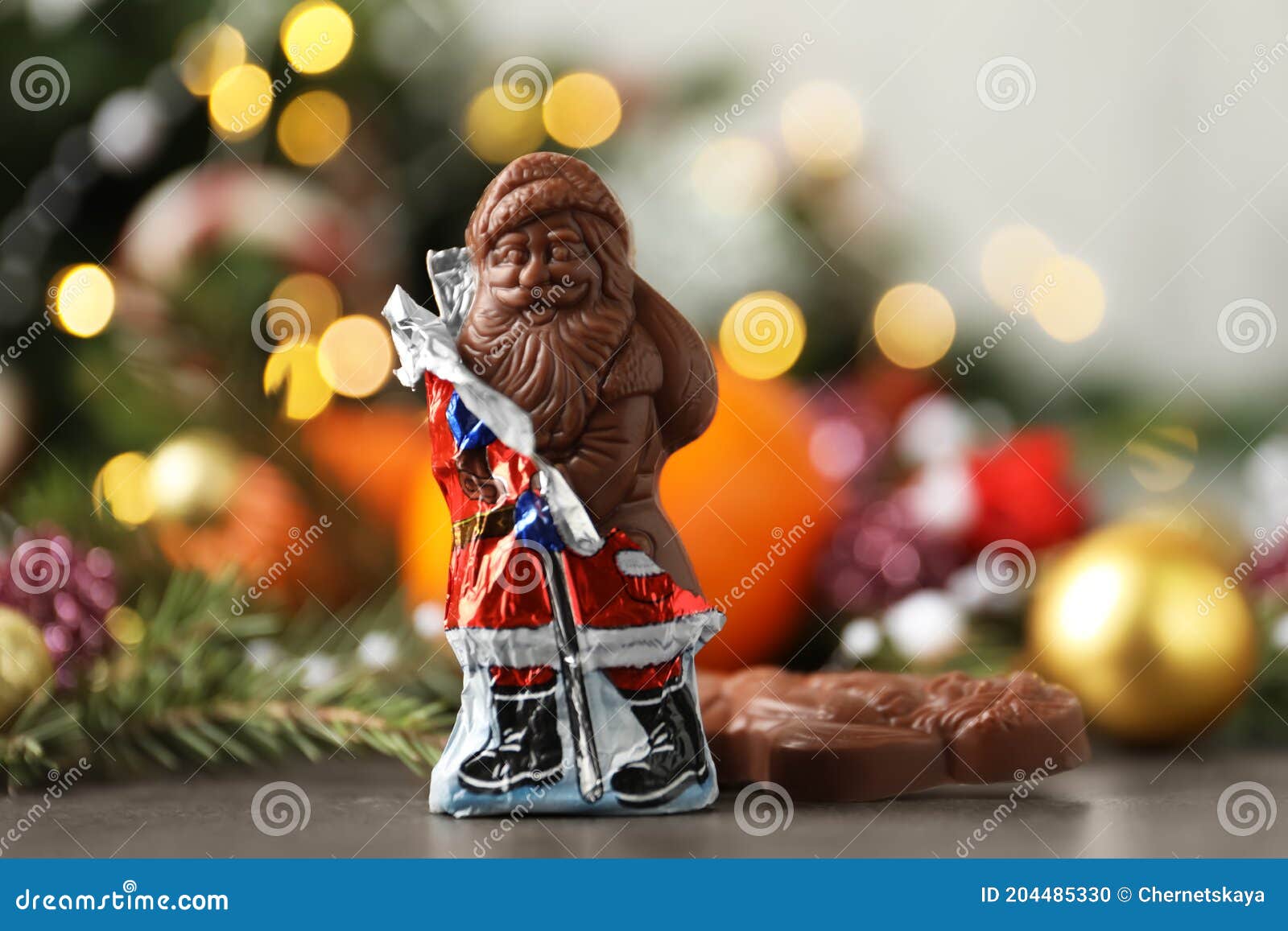 Chocolate Santa Claus Candies on Grey Table Stock Photo - Image of ...