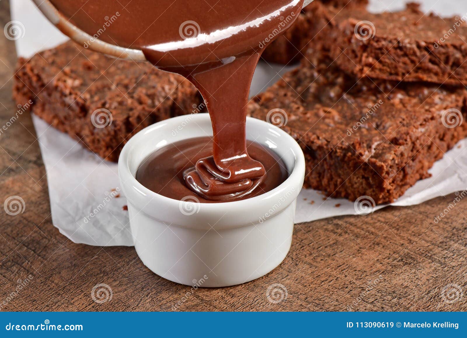 Chocolate sauce running stock image. Image of flow, brown - 113090619