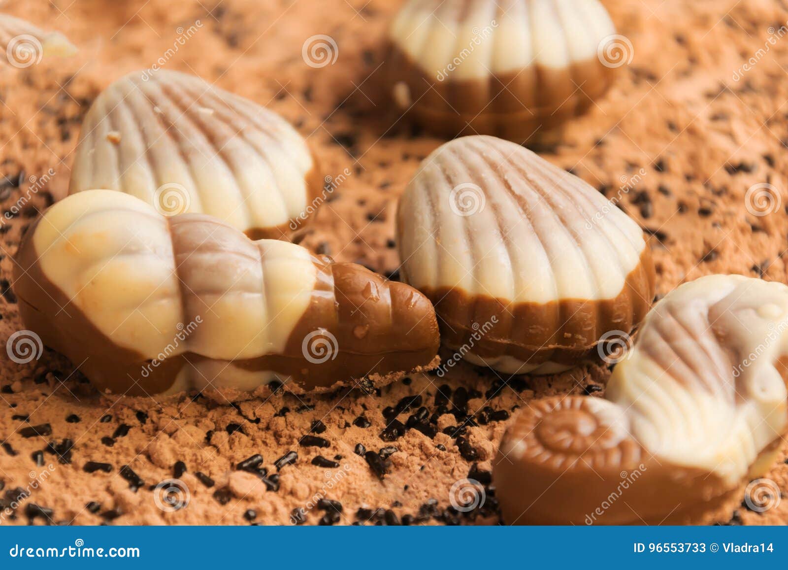 Chocolate Shells Beach Sand Stock Image - Image of shells, poster: 96553733
