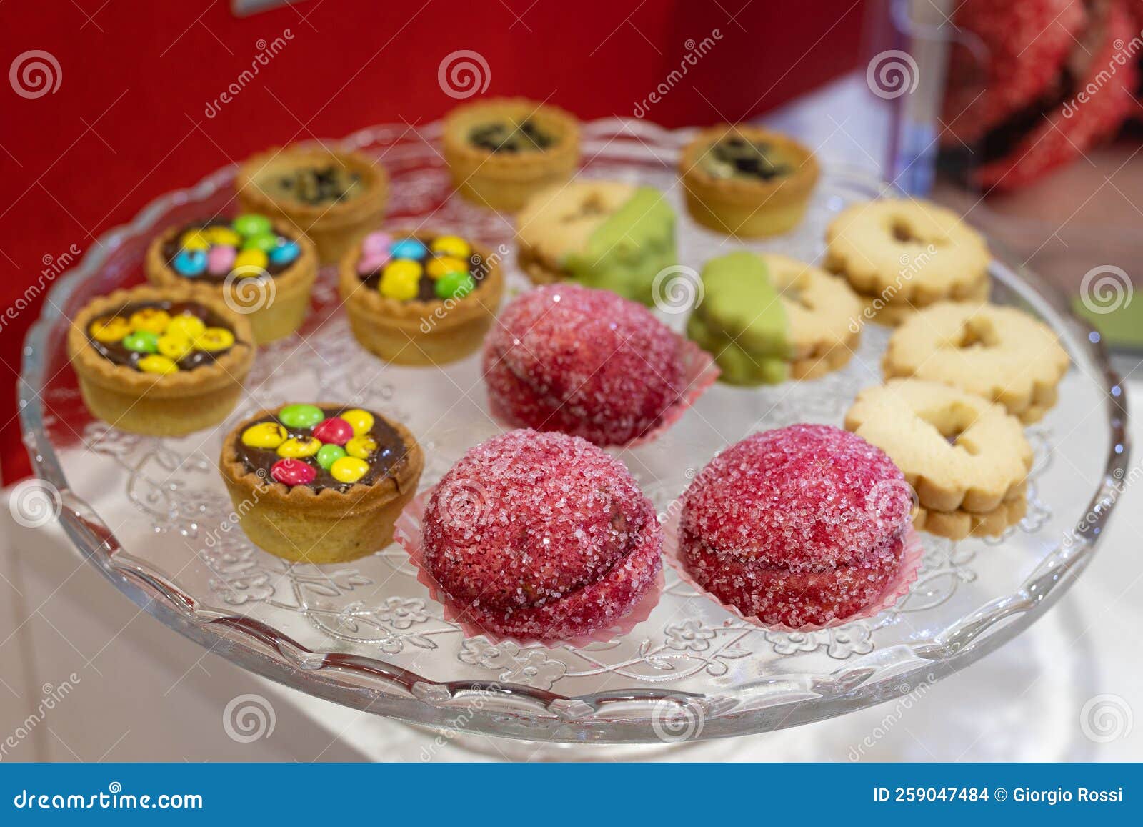 Chocolate, Shortbread, Red Sugar-coated Pastries Displayed Above a ...