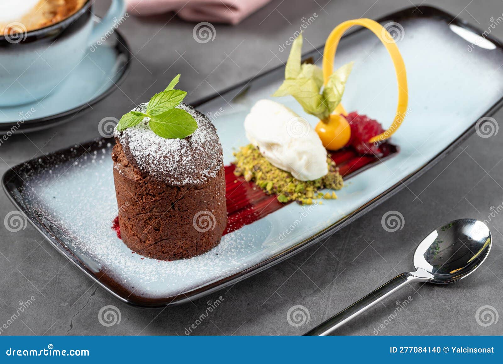 Chocolate Souffle with Ice Cream Served in a Fine Dining Restaurant ...
