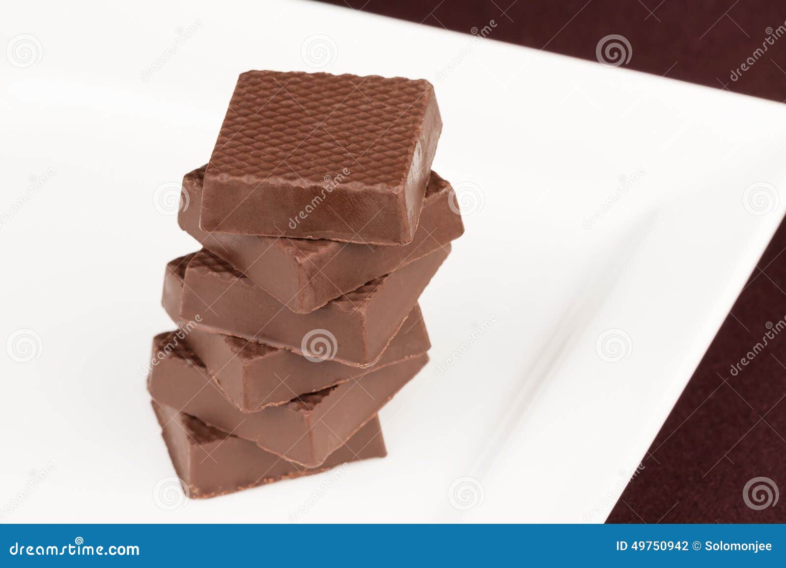 Chocolate Squares Stacked stock photo. Image of arranged - 49750942