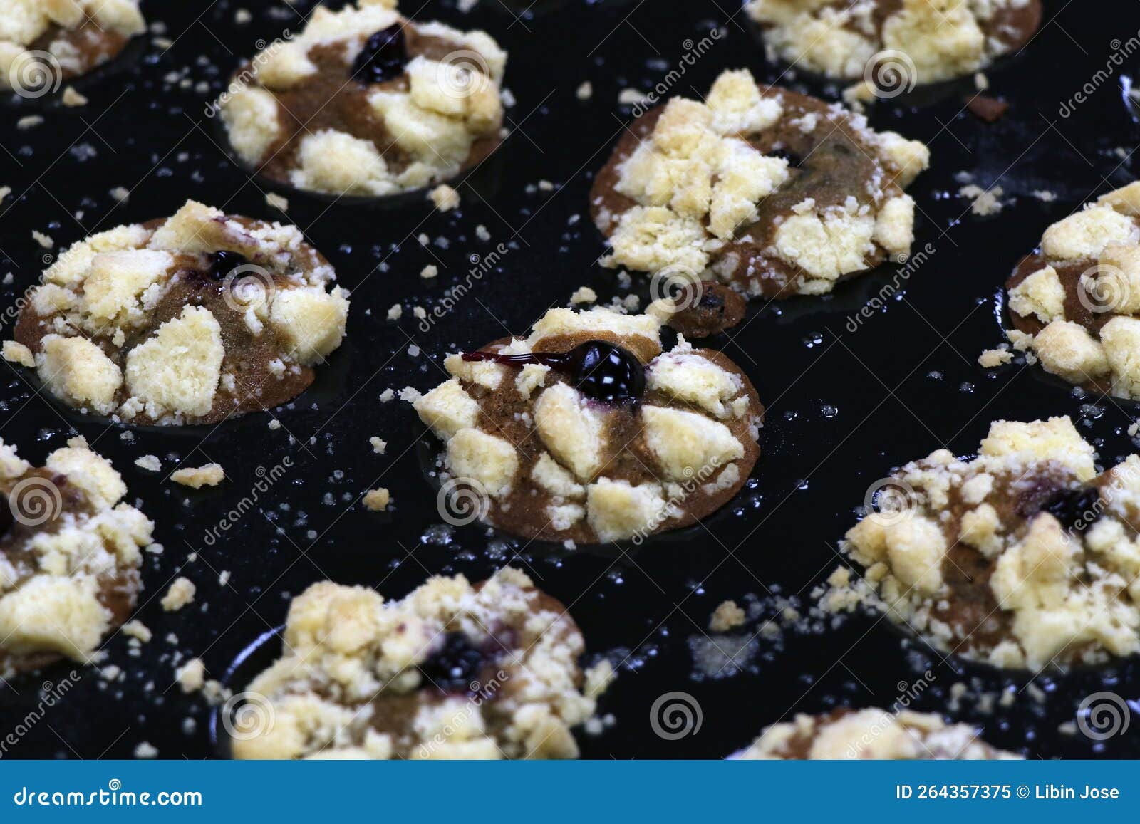 Chocolate Stuffed Baked Muffins or Cupcakes in a Bakery Sheet Stock ...