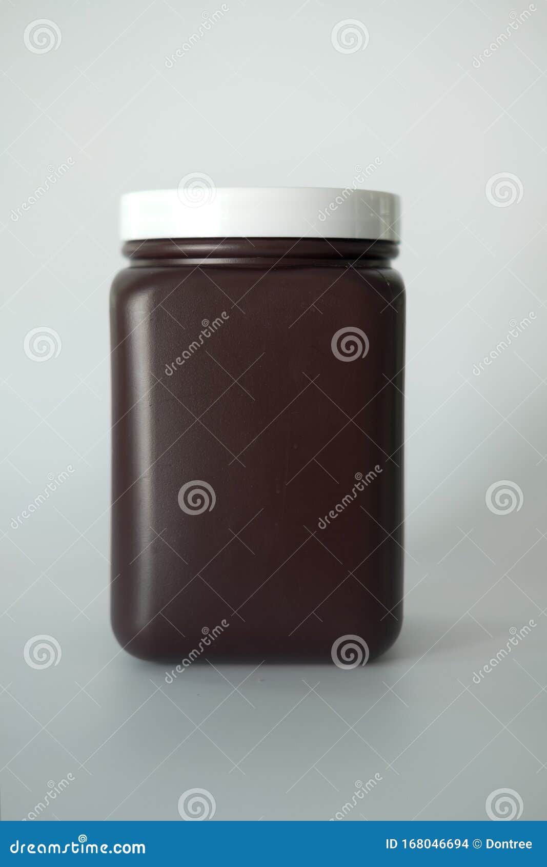 Chocolate syrup in bottle stock photo. Image of gourmet - 168046694