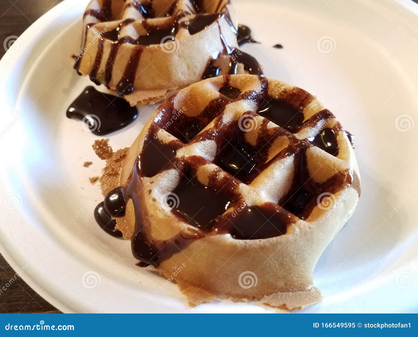 Chocolate Syrup Liquid on Waffles on White Plate Stock Image - Image of ...