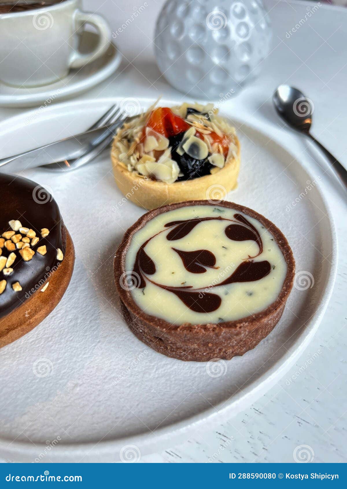 Chocolate Tartlet on a White Plate Stock Photo - Image of cake ...