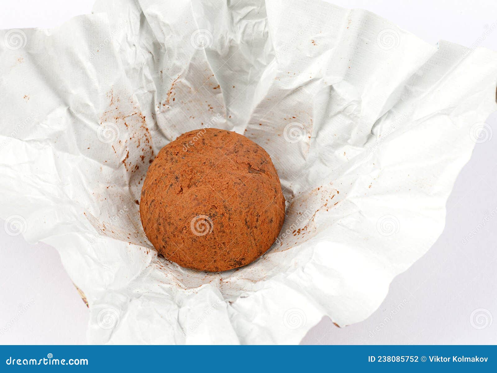 Chocolate Truffle in a Half-developed Wrapper. Delicious Candy Stock ...