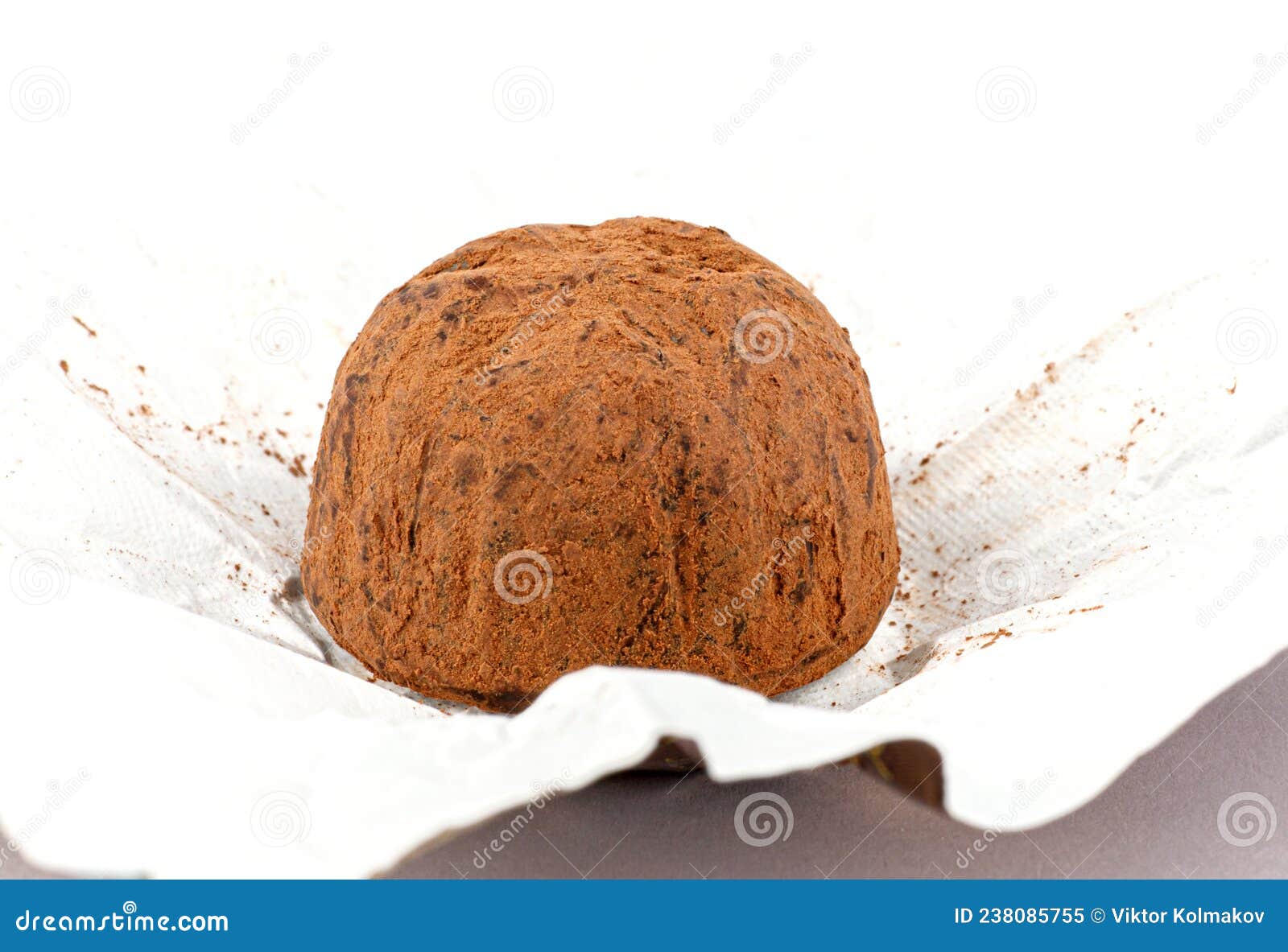 Chocolate Truffle in a Half-developed Wrapper. Delicious Candy Stock ...