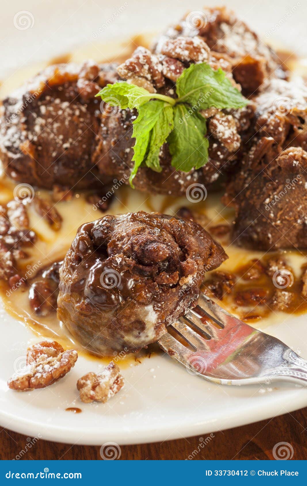 Chocolate Turtle Beignets with Creme Anglais Stock Photo - Image of ...
