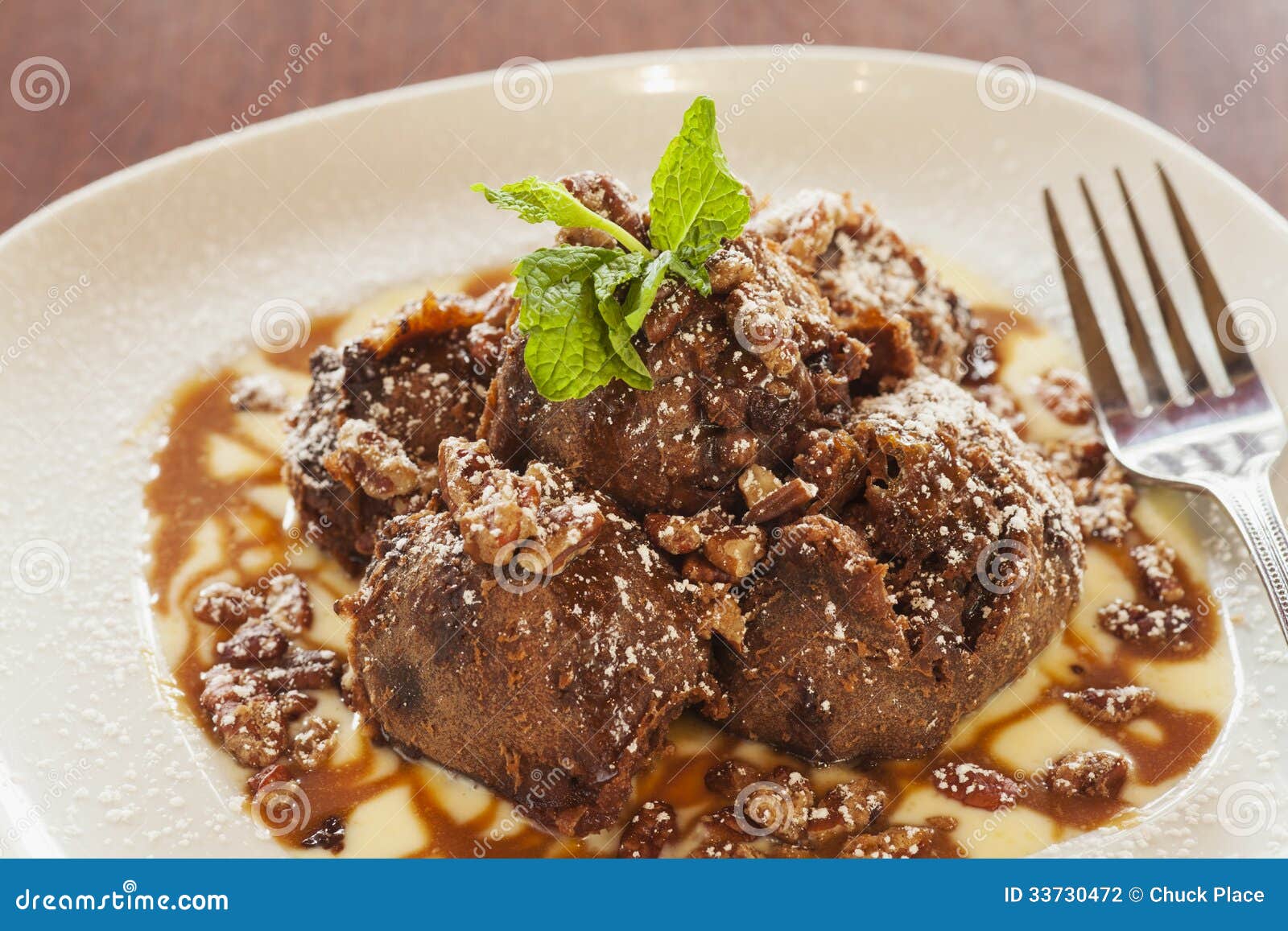 Chocolate Turtle Beignets with Creme Anglais Stock Photo - Image of ...