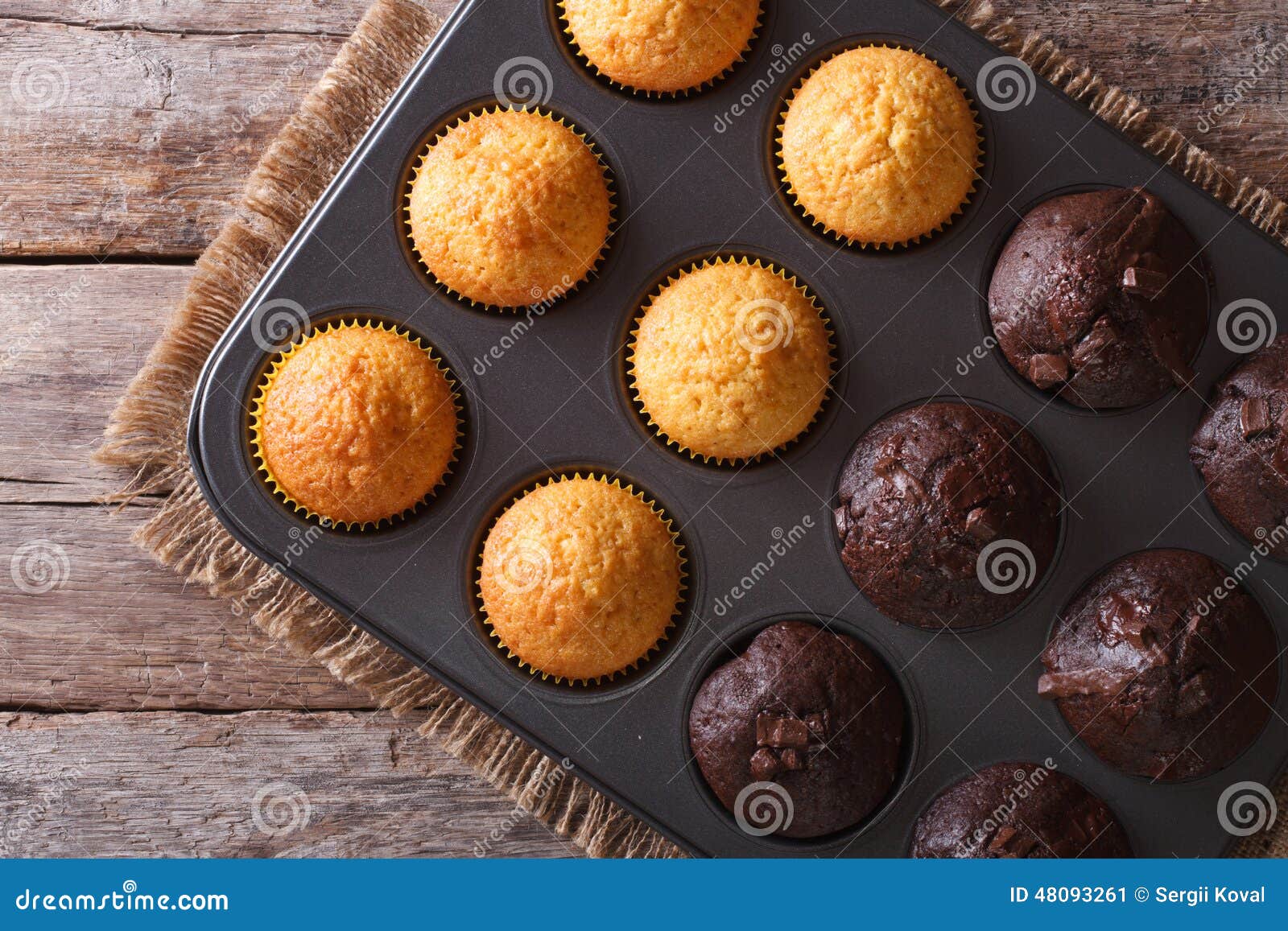 Chocolate and Vanilla Muffins in Baking Dish Top View Stock Image ...