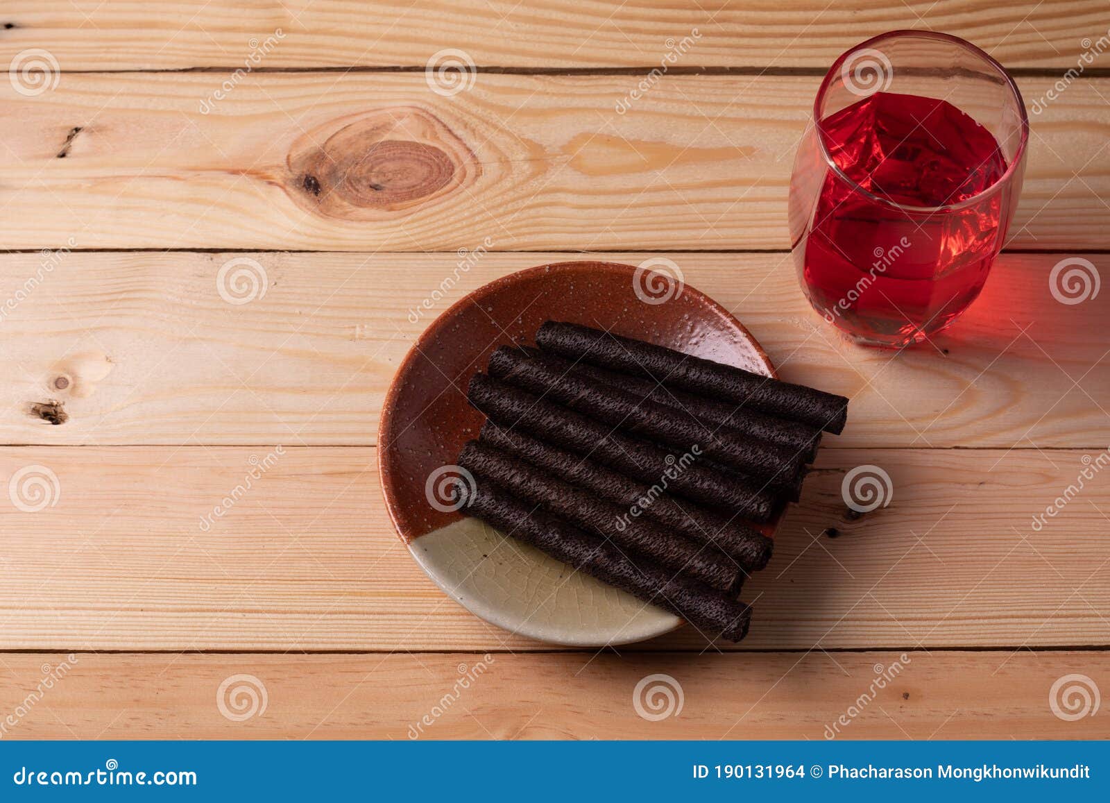 Chocolate Wafer with Red Water. Dark Tone Stock Photo - Image of syrup ...