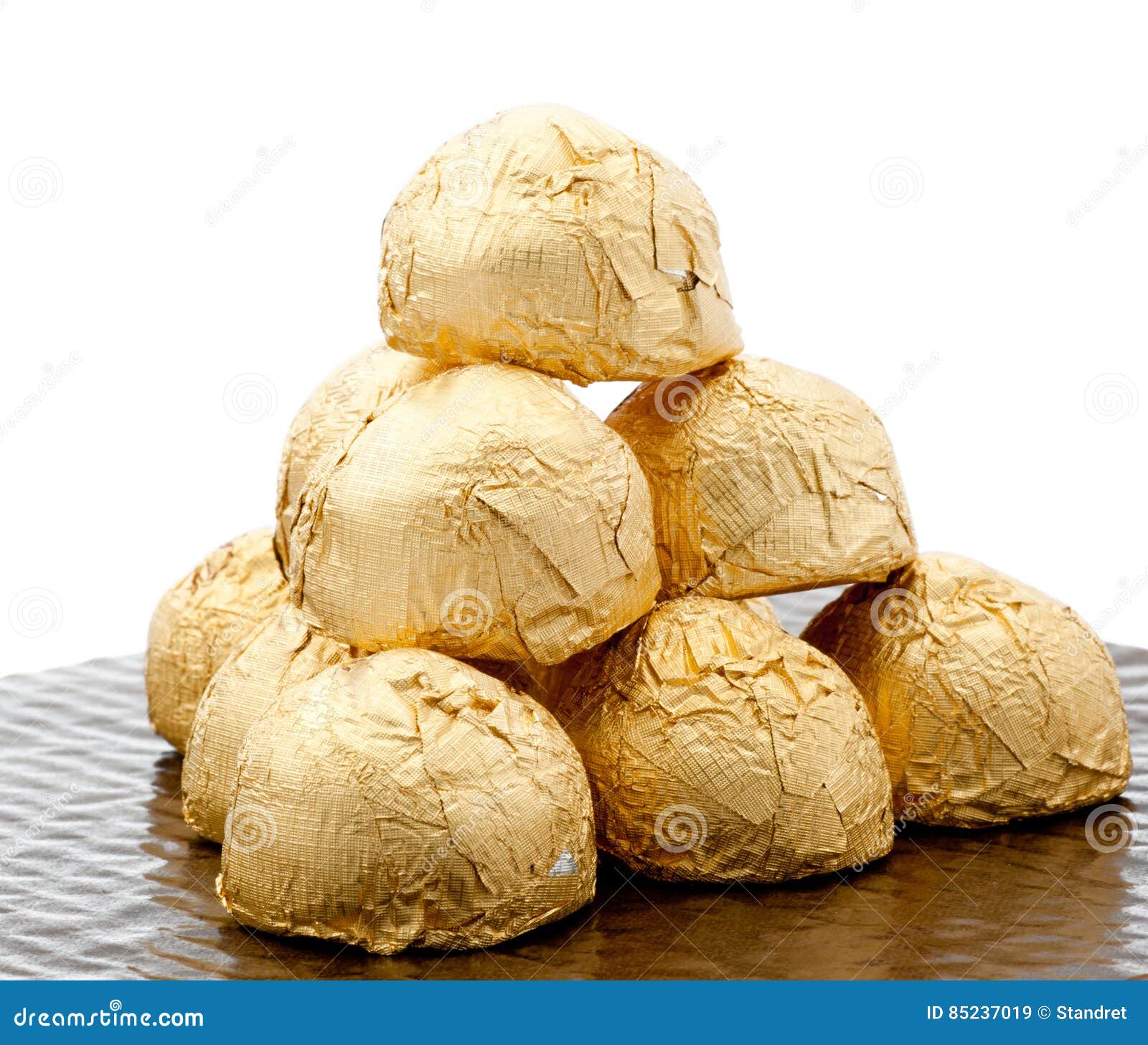 Chocolates in a Gold Foil Papper Stock Image - Image of health, ball ...