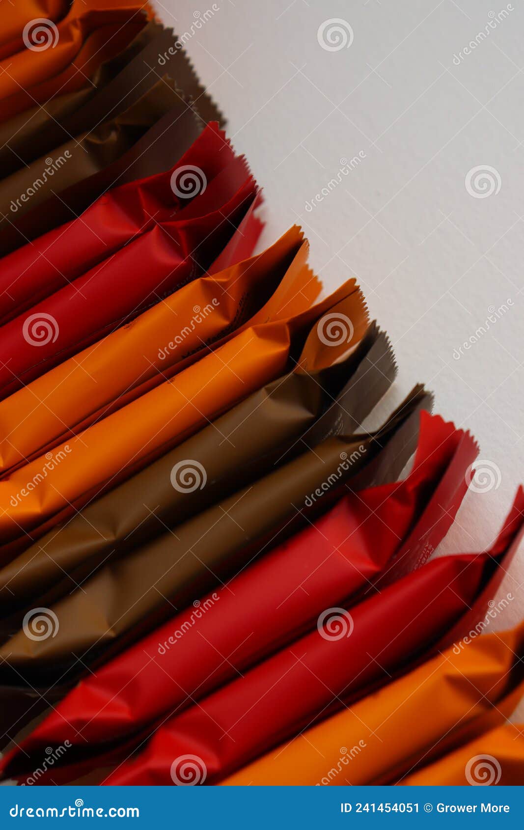Chocolates White Background.Different Color Chocolate Package Stock ...