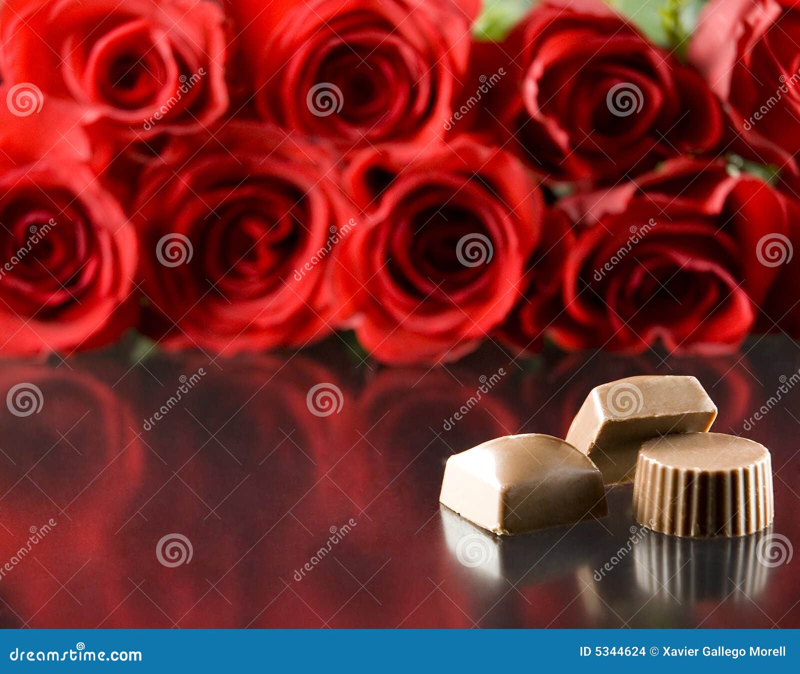 Chocolates with red roses stock photo. Image of eating - 5344624