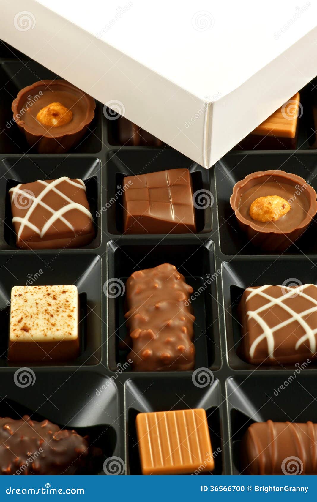 Chocolates in a box. stock photo. Image of tasty, cardboard - 36566700