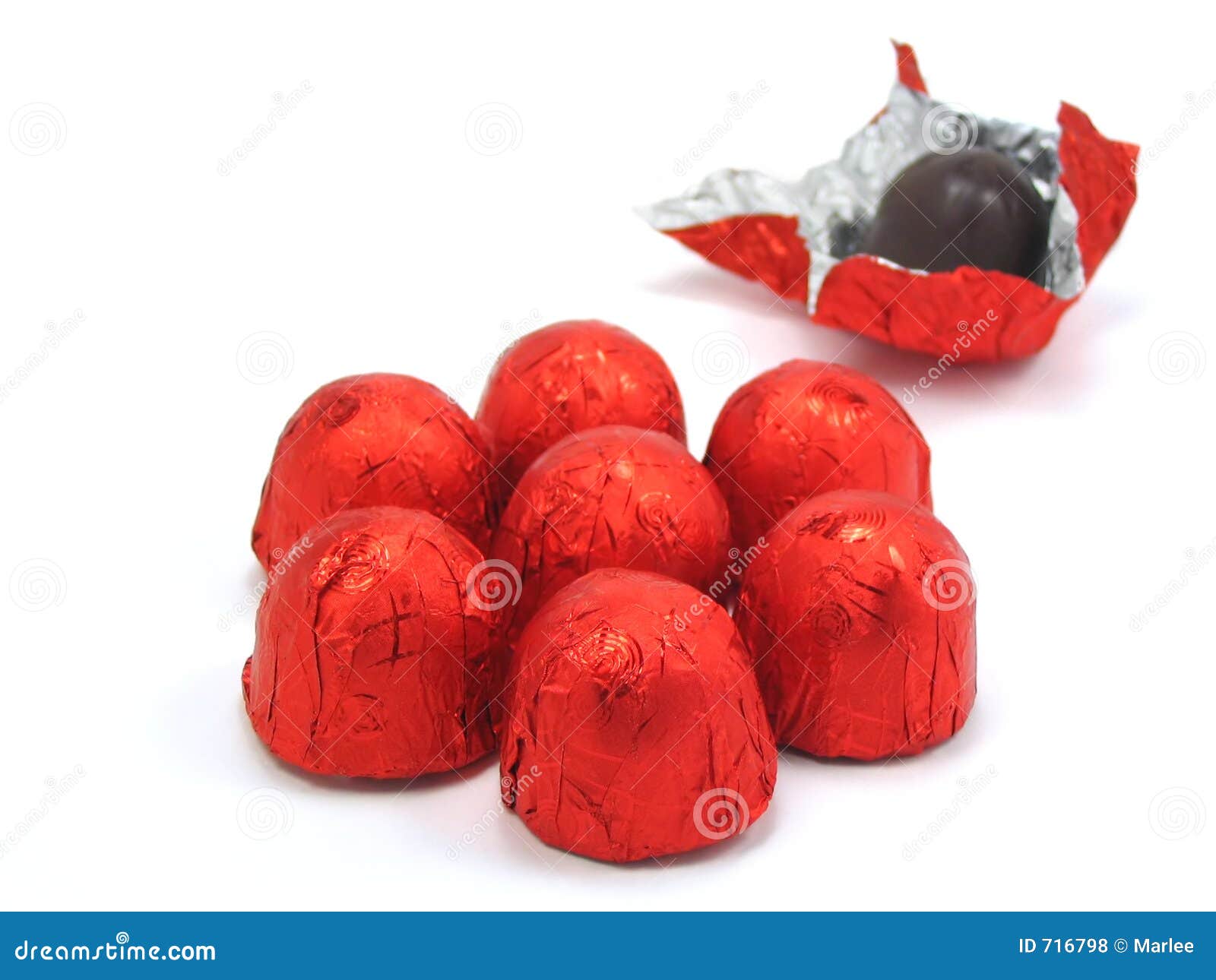 Chocolates wrapped in red stock photo. Image of dental - 716798