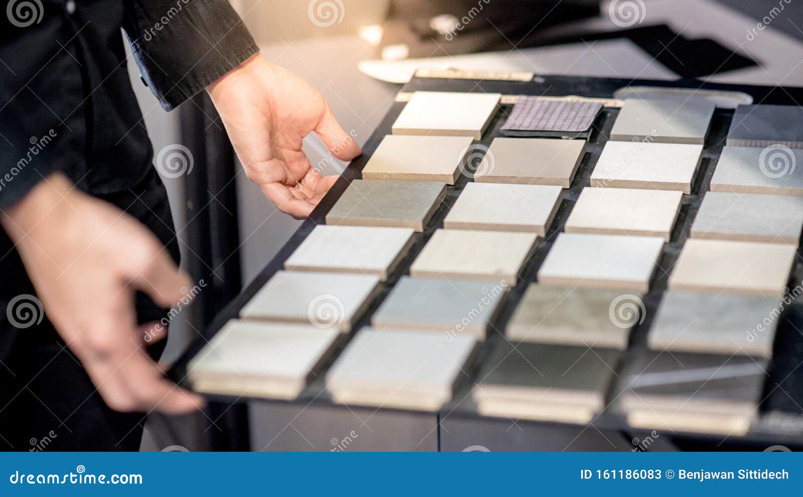 Choosing Ceramic Sample from Swatch Board Stock Image - Image of male ...