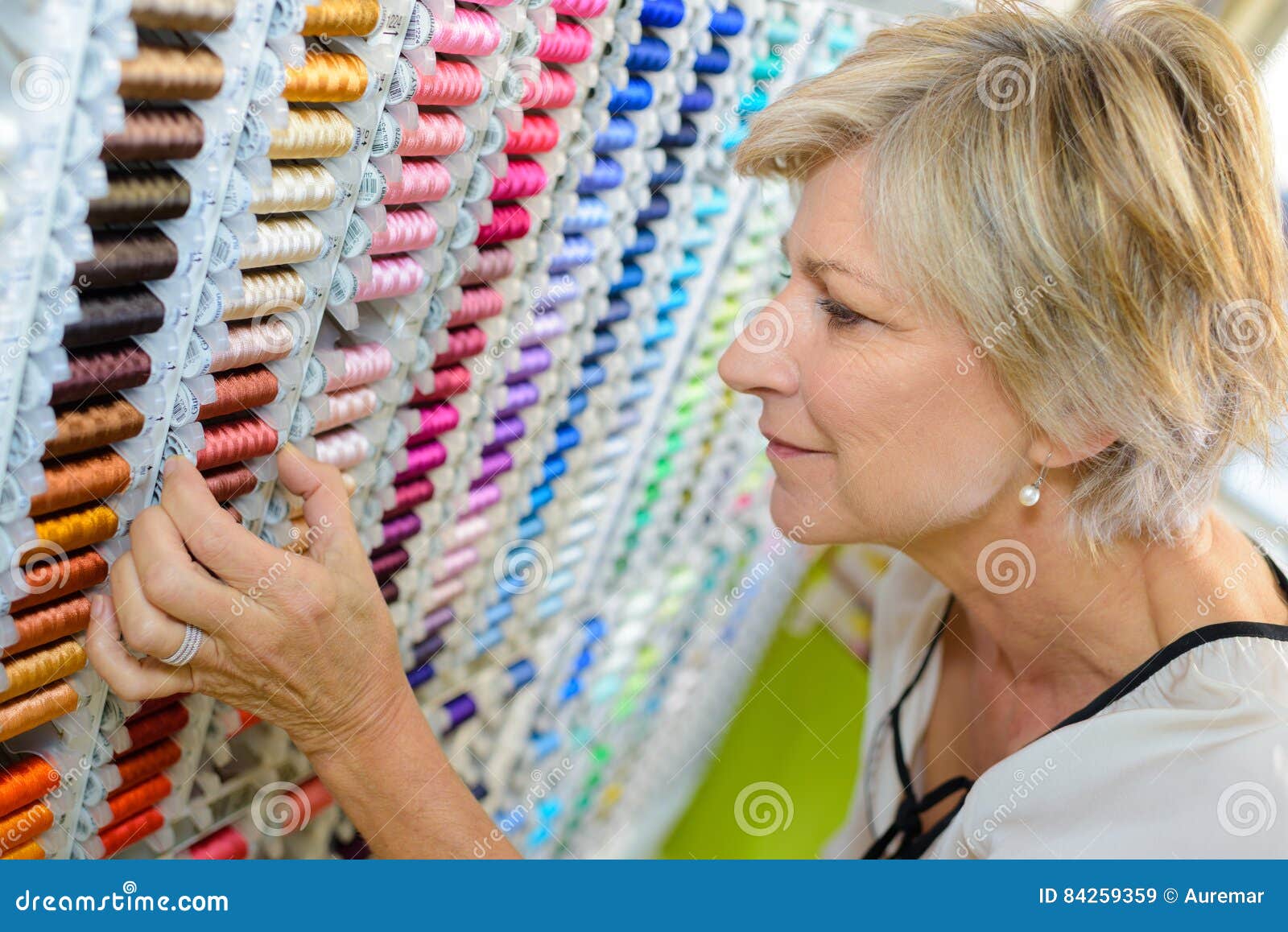 Choosing Cotton at Haberdashery Store Stock Image - Image of cotton ...