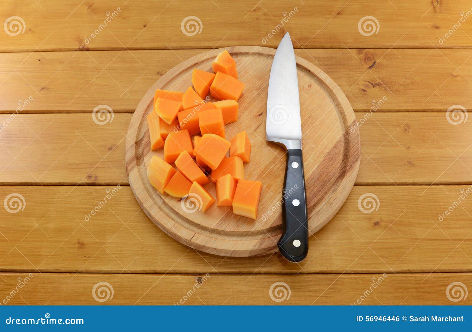 Chopped Butternut Squash with a Knife on a Chopping Board Stock Photo ...