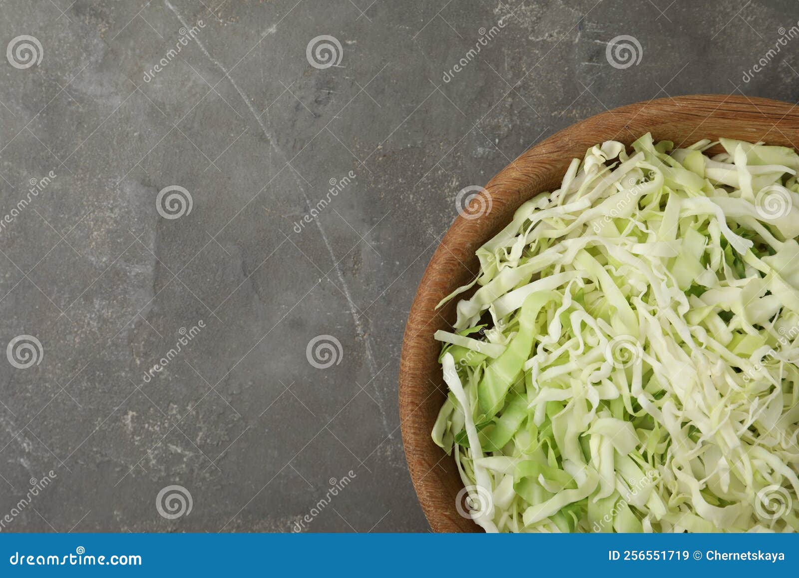 Chopped Cabbage in Bowl on Grey Table, Top View. Space for Text Stock ...