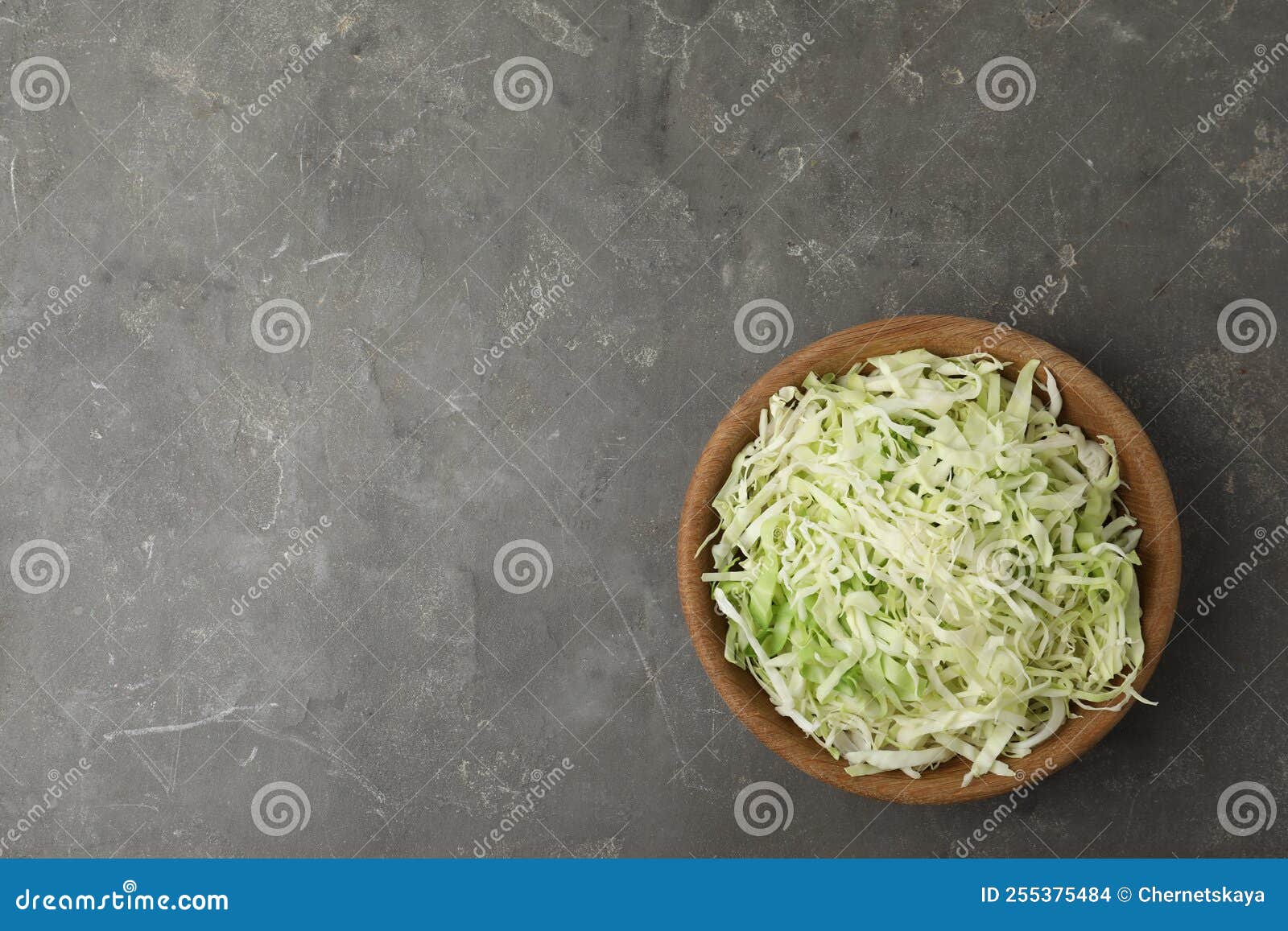 Chopped Cabbage in Bowl on Grey Table, Top View. Space for Text Stock ...